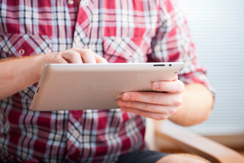 Closeup Shot of Male Hands Using a Tablet Stock Photo - Image of ...