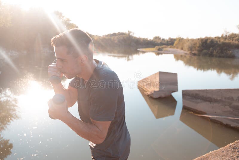 Closeup Shot of a Male Training Next To the River Stock Image - Image ...