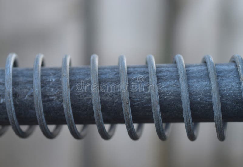 Closeup Shot of Metal Coil Spring on a Gate Post Stock Photo - Image of ...