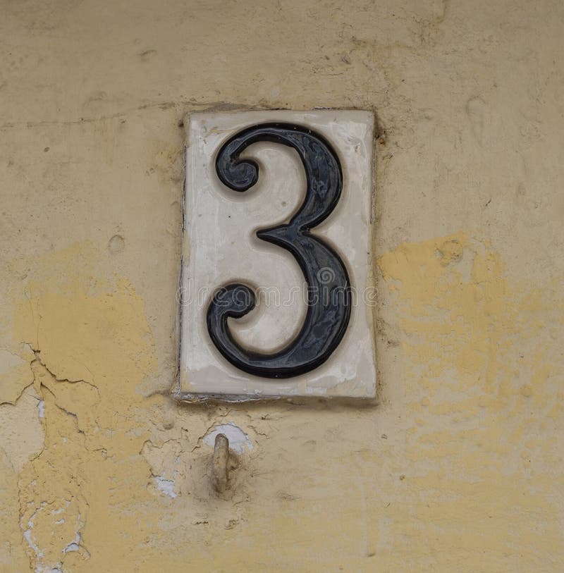 Closeup Shot of a Number Three Sign on the Wall Stock Photo - Image of ...