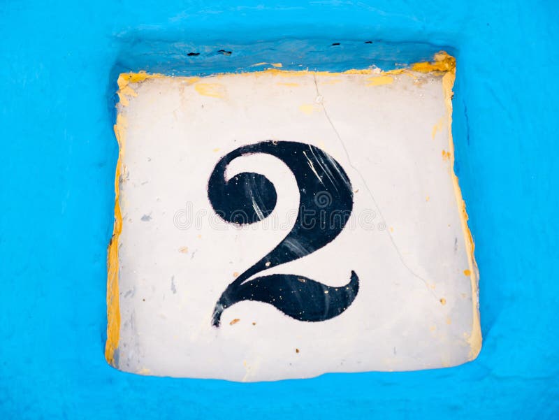 Closeup Shot of Number Two on the Wall Stock Photo - Image of figure ...