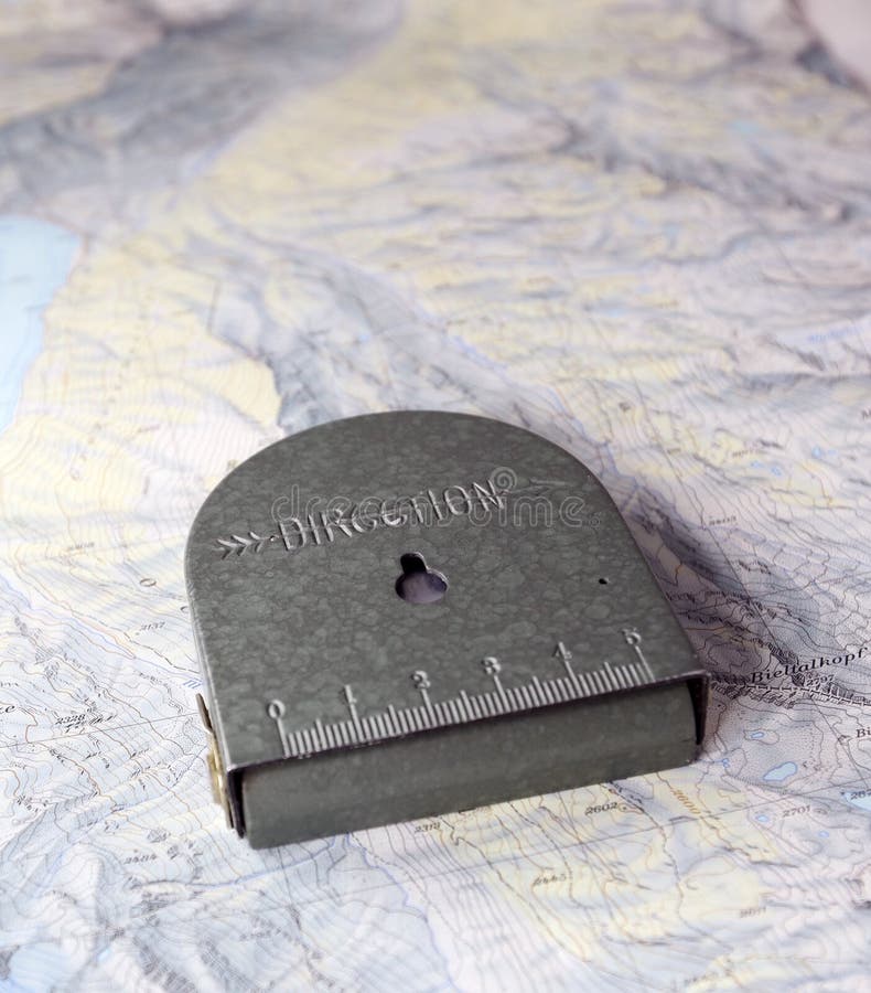 Closeup Shot of an Old Metallic Compass and Ruler on a Marble Surface ...