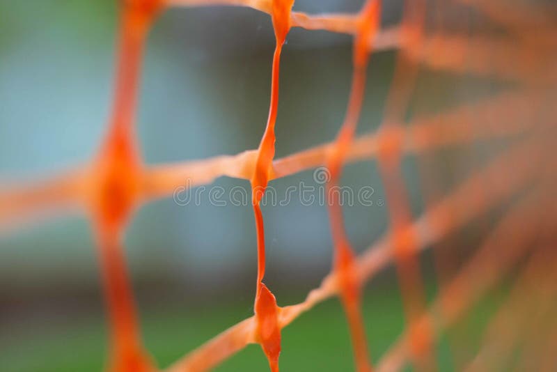 Closeup Shot of an Orange Net with a Blurred Background Stock Image ...
