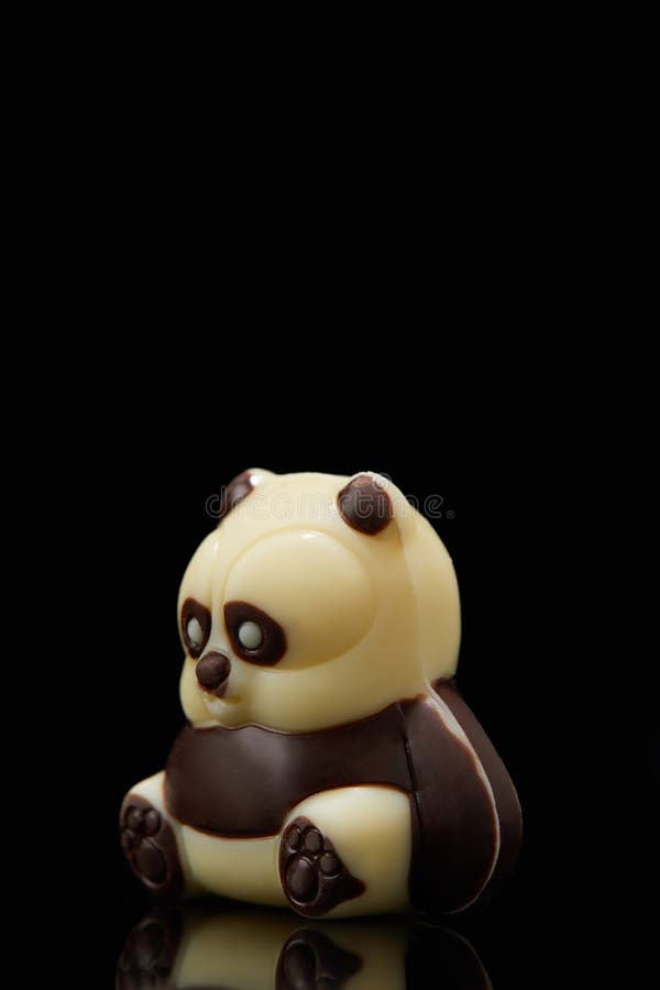 Closeup Shot of Panda Shaped Chocolate on Black Background Stock Image ...