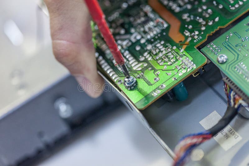 Closeup Shot of a Persons Hand Working on a Motherboard Stock Image ...