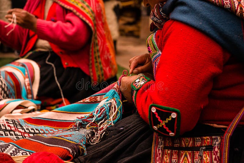 Closeup Shot of Peruvian Women Working on Beautiful Handmade Textiles ...