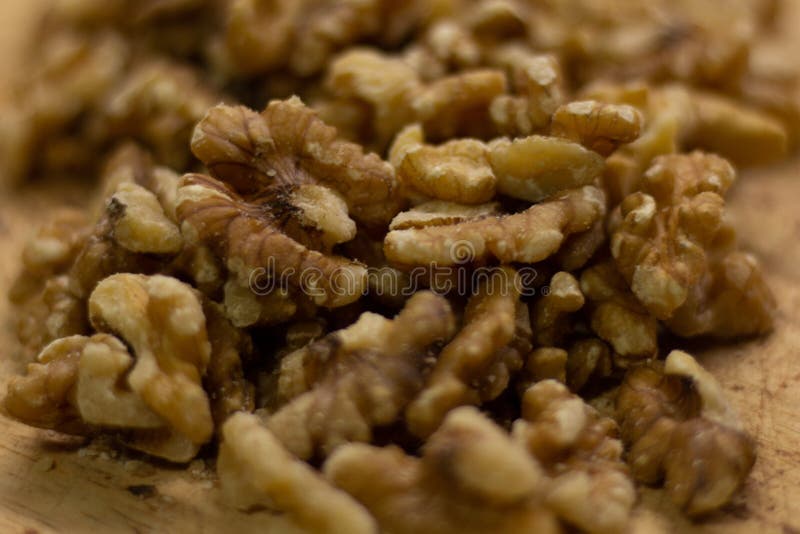 Closeup Shot of a Pile of Unshelled Walnut Details Stock Photo - Image ...