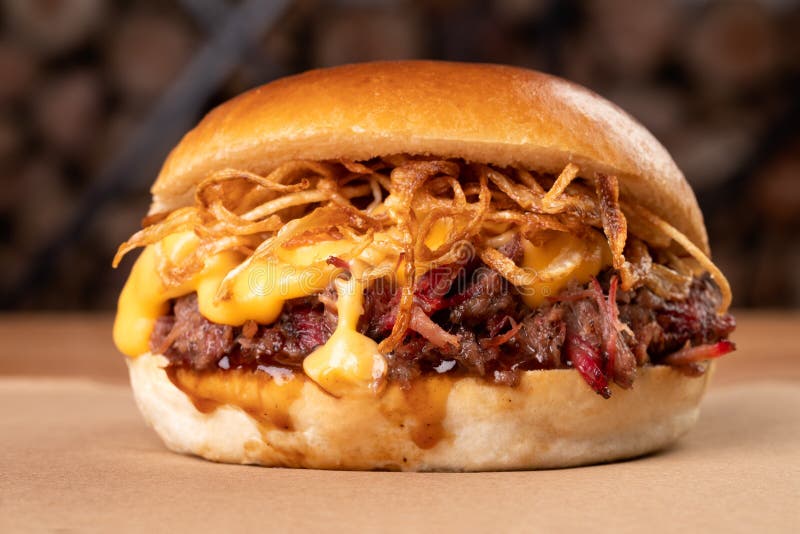 Closeup Shot of a Pulled Beef Burger with Cheese and Fried Onions Stock ...