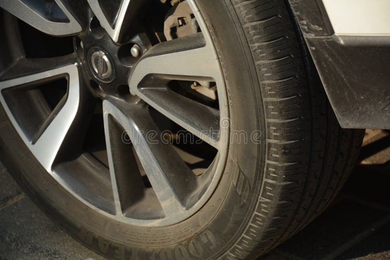 A Closeup Shot of Rear Side View Front Wheel. a Car Tire Stock Photo ...