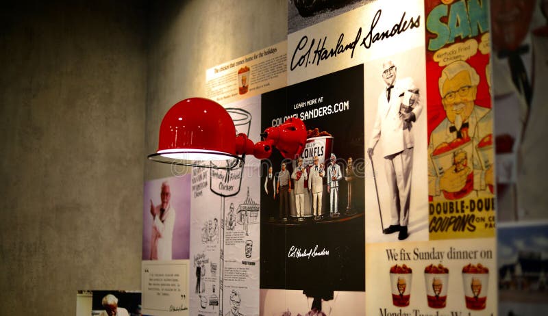 Closeup Shot of a Red Lamp on a Wall with Vintage KFC Posters Editorial ...