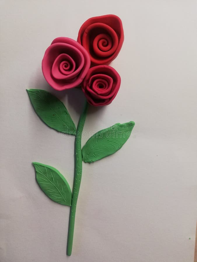 Closeup Shot of Red Roses Made Out of Clay on a White Surface Stock ...