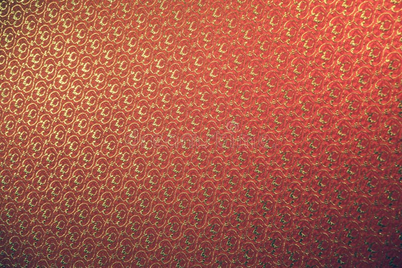 Closeup Shot of a Red Textured Surface with Golden Intricate Patterns ...