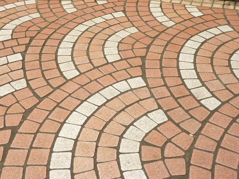 Closeup Shot of a Red and White Cobblestone Stock Photo - Image of ...