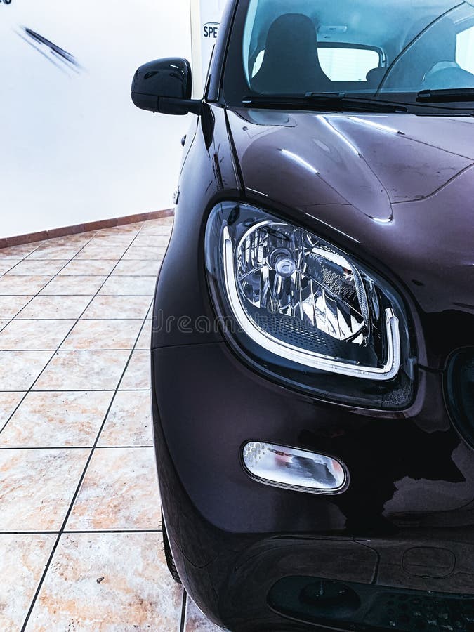 Closeup Shot of the Right Headlight of Purple Modern Car Stock Image ...