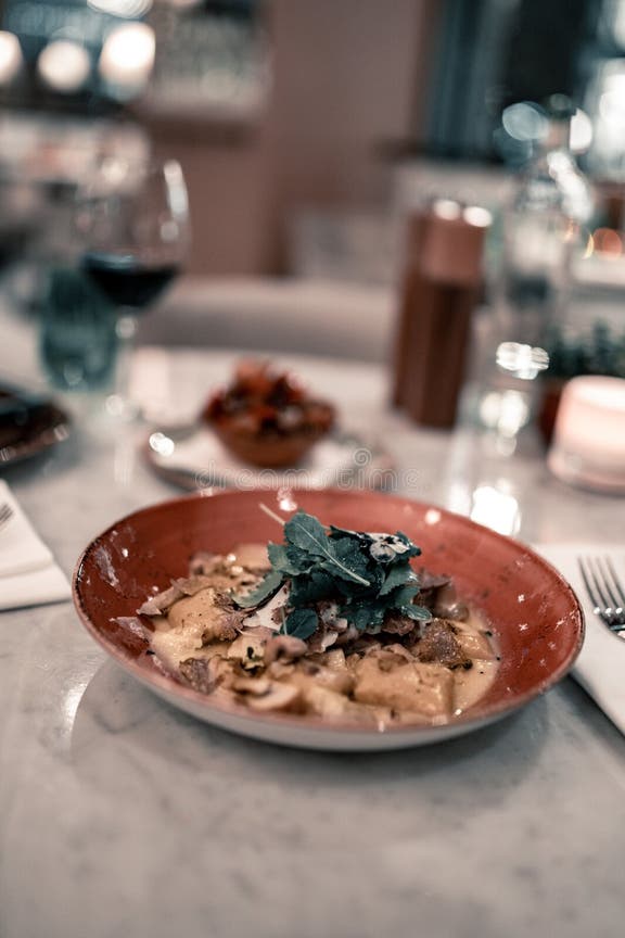 Closeup Shot of Risotto on a Table in a Restaurant Stock Photo - Image ...