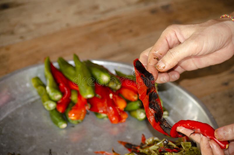 Closeup Shot of Roasted Spicy Chiles in Human Hands Stock Image - Image ...