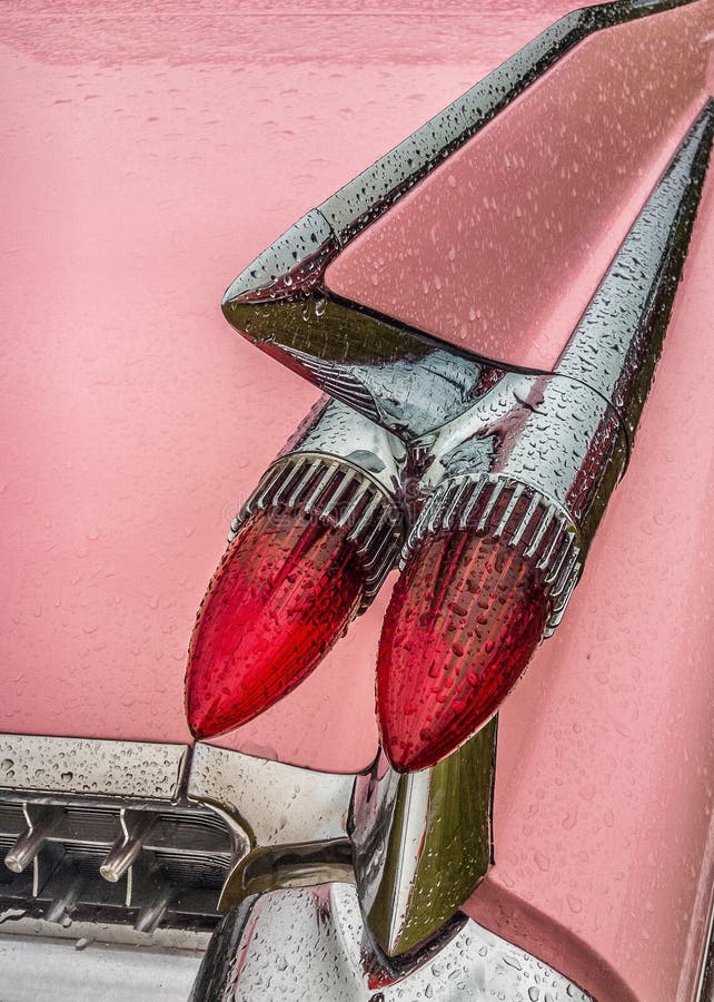 Closeup Shot of a Rocket Shaped Light of a Modern Pink Car Stock Photo ...