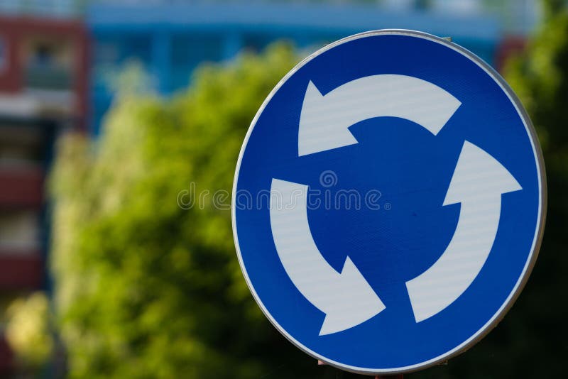 Closeup Shot of a Roundabout Sign Stock Photo - Image of street, travel ...