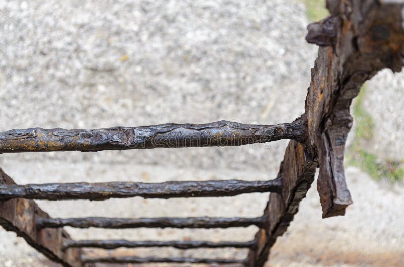 Closeup Shot of a Rusty Metal Ladder on the Stone Pier Stock Photo ...