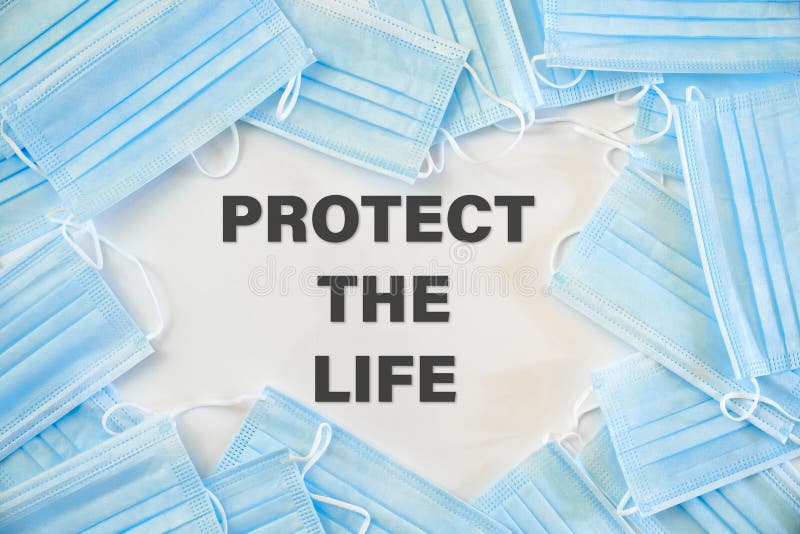 Closeup Shot of Sanitary Masks and a Writing Protect the Life`` Stock ...