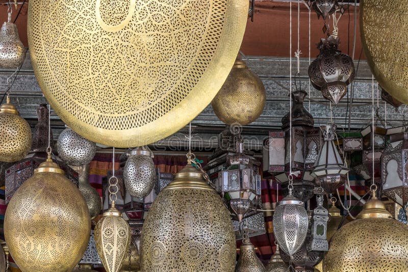 Closeup Shot of Several Metal Lamps and Patterned Objects Hanging from ...