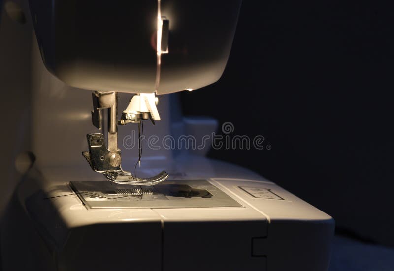 Closeup Shot of a Sewing Machine with Light on a Stock Photo - Image of ...