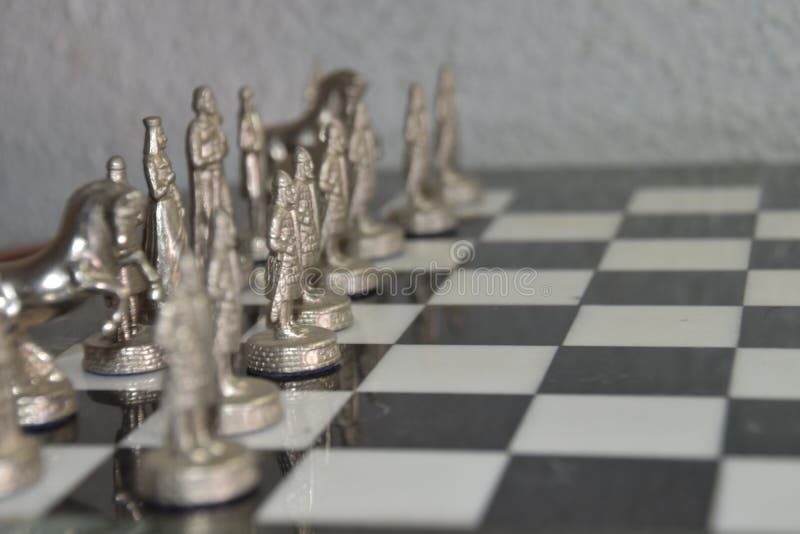 Closeup Shot of Silver Realistic Chess Pieces on a Board Stock Photo ...
