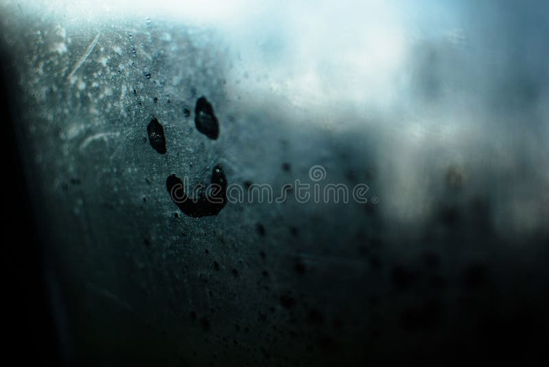 Closeup Shot of a Smiley Face Drawn on the Steamed Glass Stock Image ...