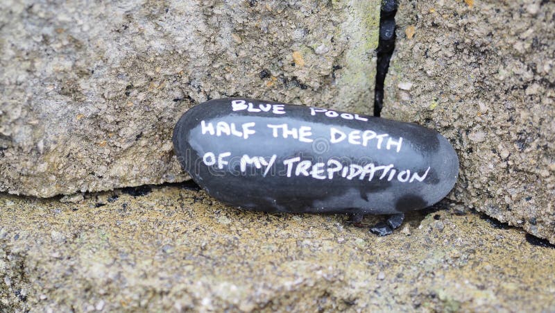 Closeup Shot of Smooth and Shiny Rock with Text Stock Photo - Image of ...