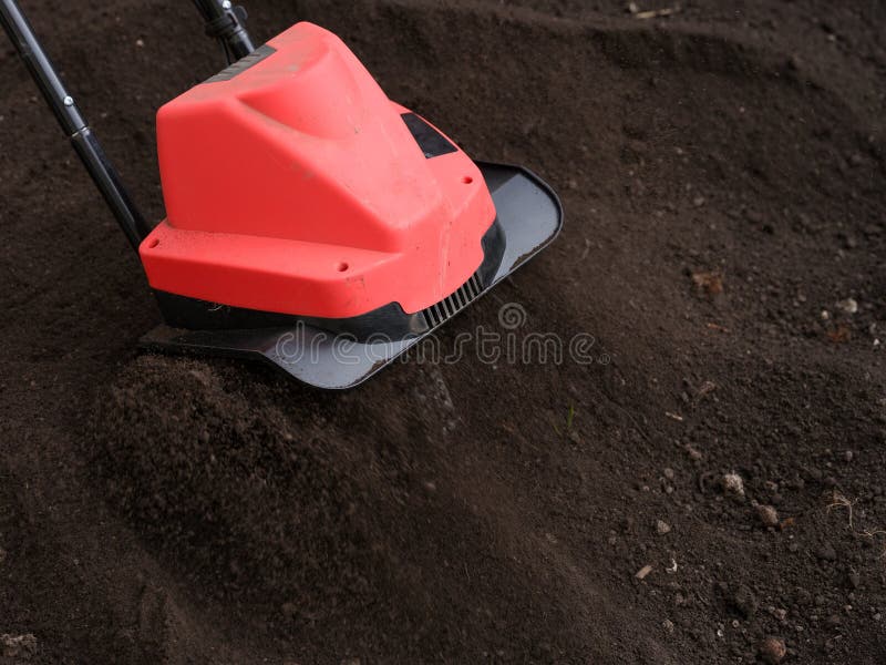 Closeup Shot of Soil Being Tilled Using a Cultivator Stock Image ...