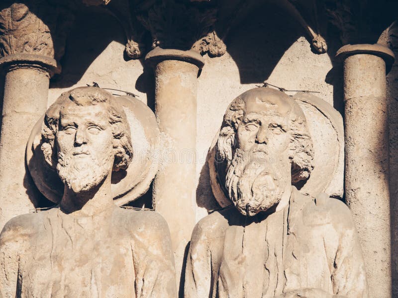 Closeup Shot of Statues of Human Figures on an Exterior Wall of a ...