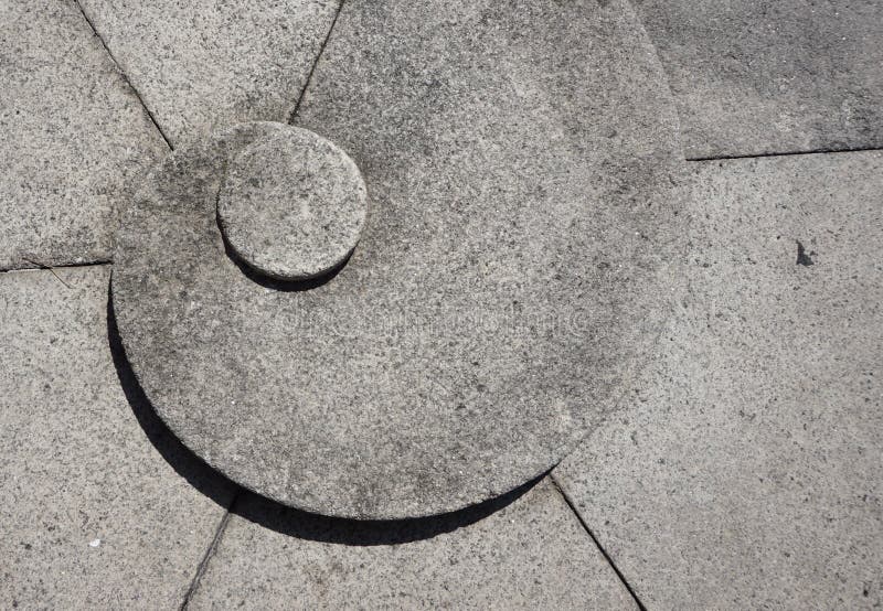 Closeup Shot of a Stone Surface with a Nautilus Shell Shape Stock Photo ...
