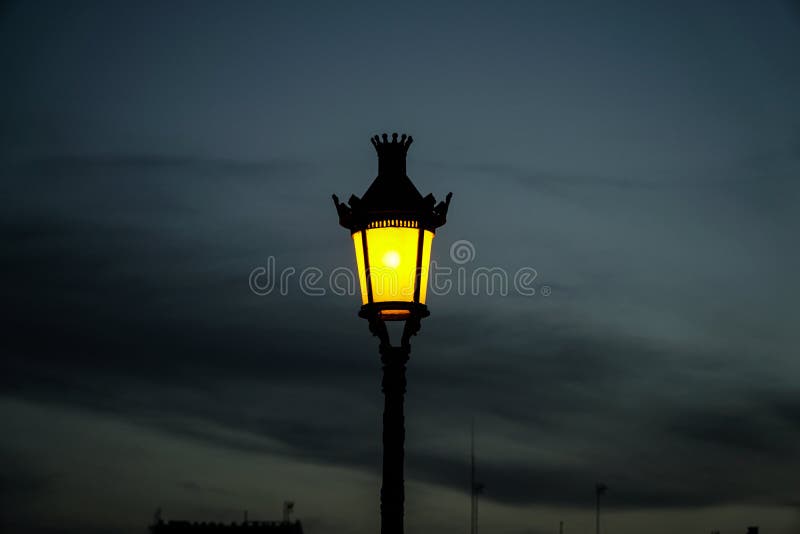 Closeup Shot of a Street Light with a Bright Yellow Light at Night ...