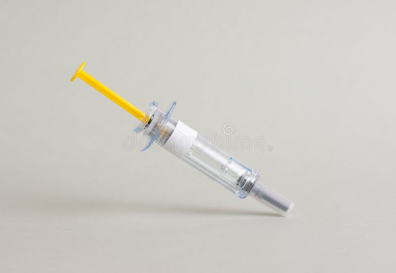 Closeup Shot of a Syringe on a Monochrome Grey Background Stock Image ...