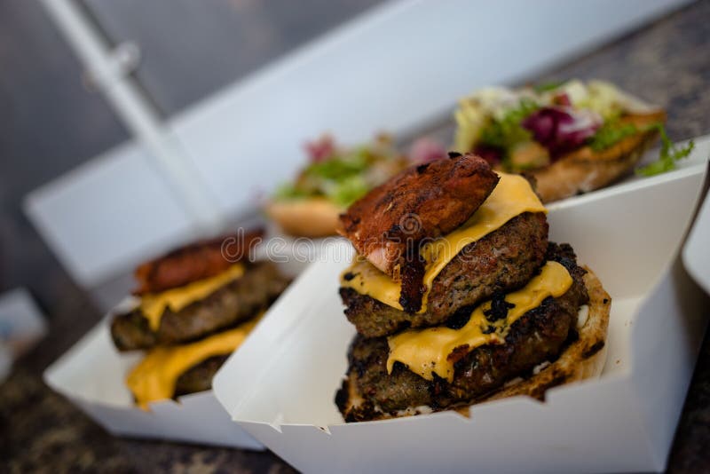 Closeup Shot of a Takeaway Box with Burger Patties and Cheese Stock ...