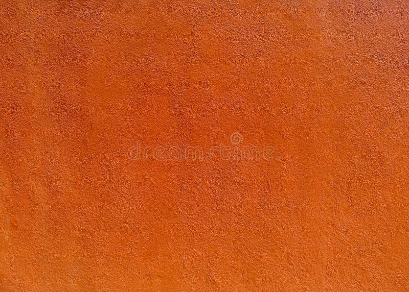 Closeup Shot of the Textures and Patterns on a Wall with Orange Paint ...