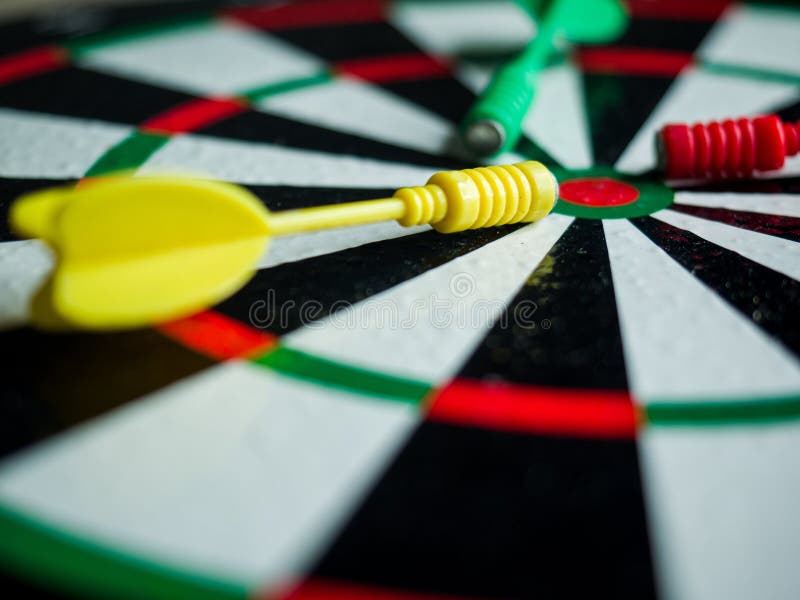 Closeup Shot of Three Colored Darts on a Dartboard Stock Image - Image ...