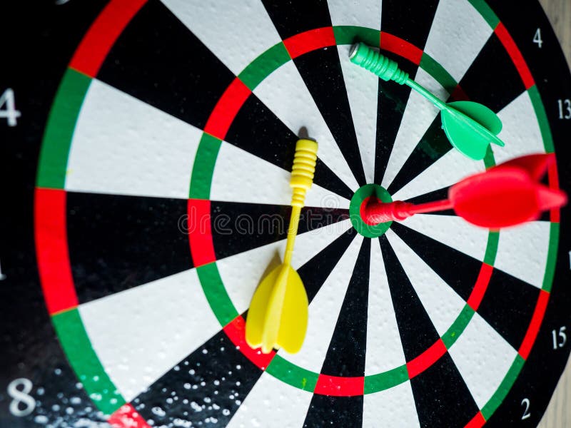 Closeup Shot of Three Colored Darts on a Dartboard Stock Image - Image ...