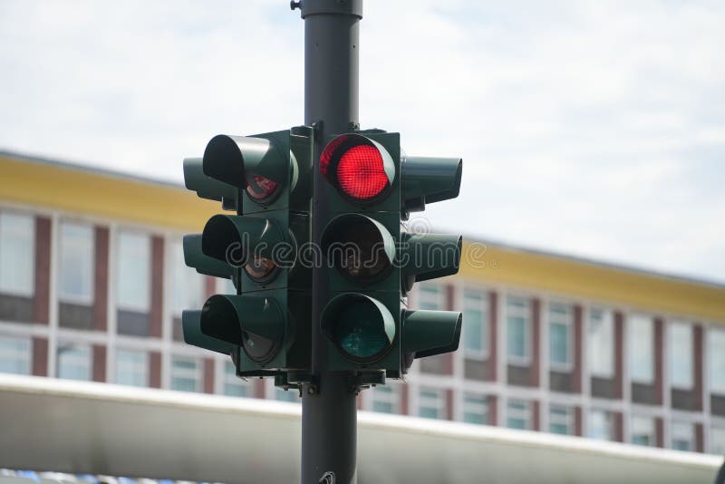 Closeup Shot of a Traffic Light Showing a Red Stoplight in the Street ...