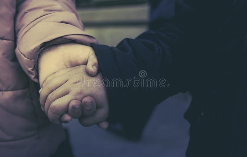 Closeup Shot of Two Partners Holding Hands Together Stock Photo - Image ...