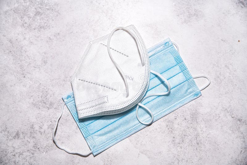 Closeup Shot of Two Types of Medical Face Masks Stock Photo - Image of ...