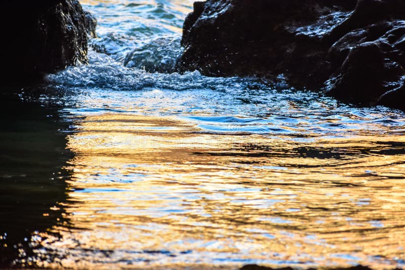 Closeup Shot of the Water Flowing between the Rocks Stock Photo - Image ...