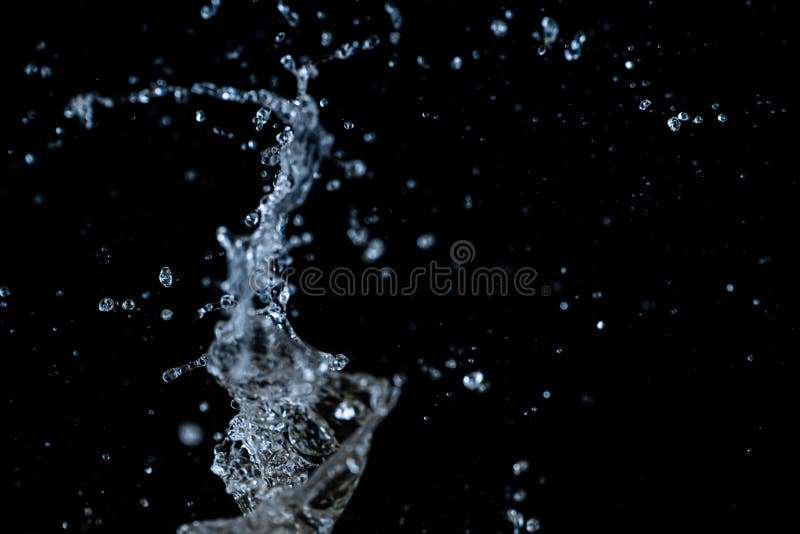 Closeup Shot of a Water Splash on a Black Background Stock Image ...