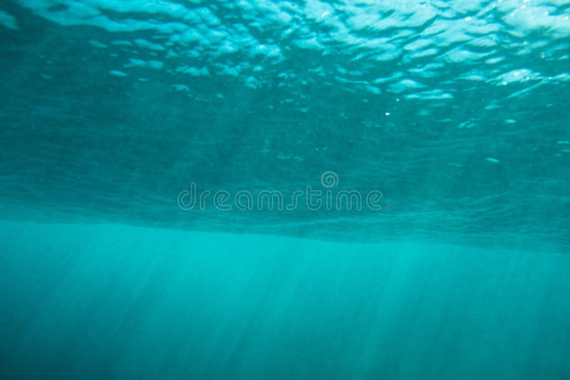 Closeup Shot of a Water Surface with the Reflection of Beautiful Sun ...