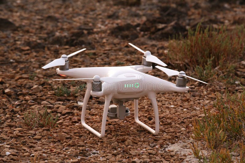 Closeup Shot of a White Drone on an Autumnal Ground Stock Photo - Image ...