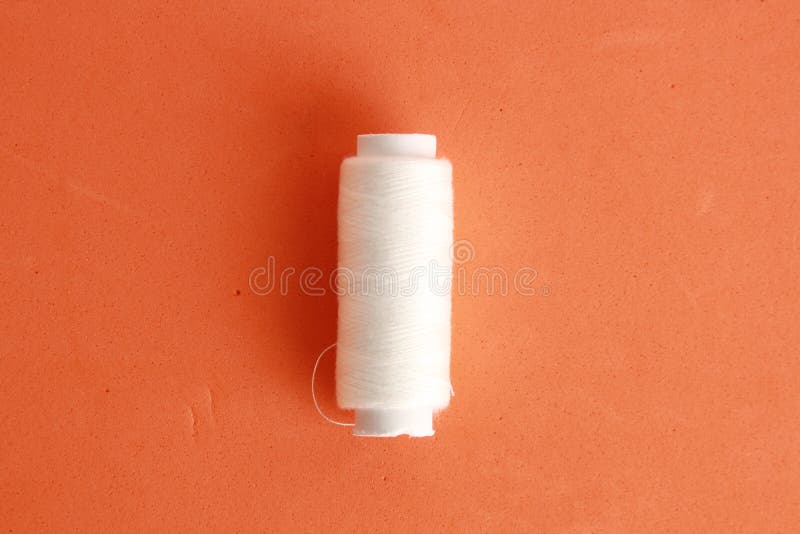 Closeup Shot of a White Sewing Thread Roll Stock Image - Image of ...