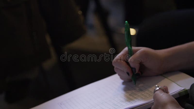 Closeup Shot of the Woman S Hands while Taking Notes during the ...