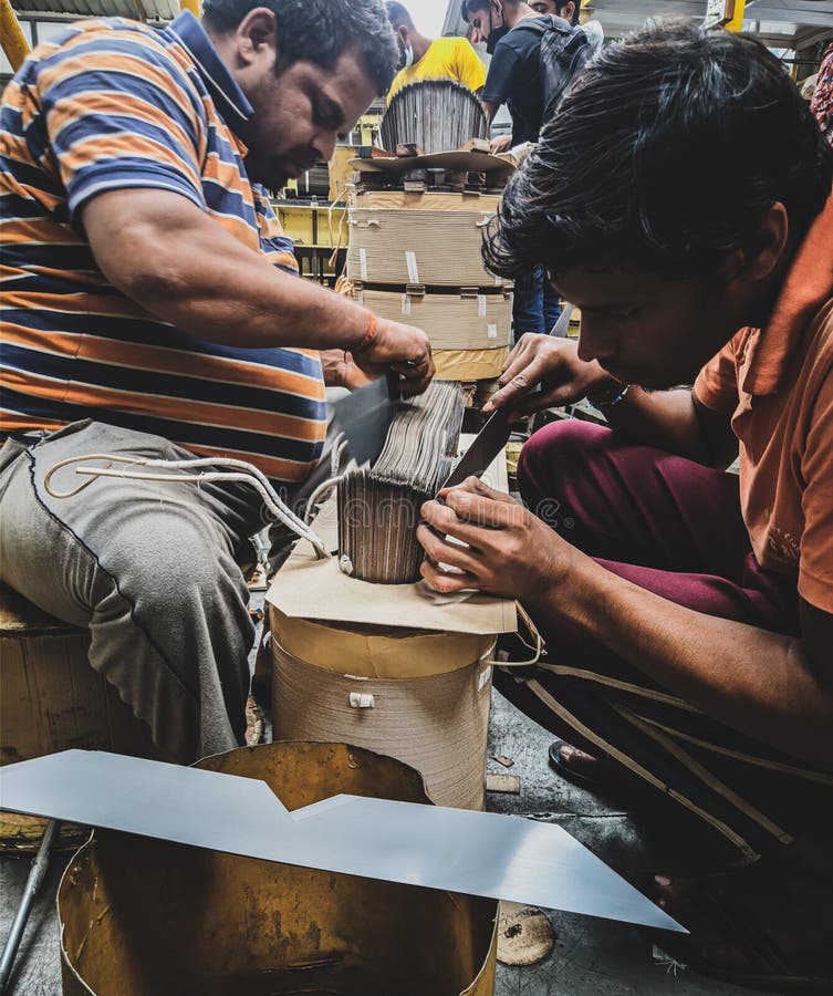 Closeup Shot of Workers Arranging the Internal Parts of the Transformer ...