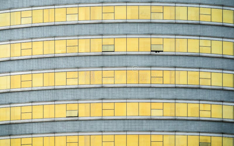 Closeup Shot of the Yellow Windows of a Modern Building Stock Image ...