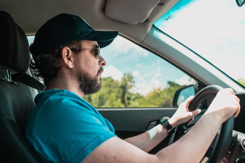 Closeup Shot of a Young Man Riding a Car Stock Image - Image of ...